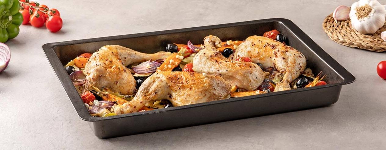 Cuartos traseros de pollo con verduras